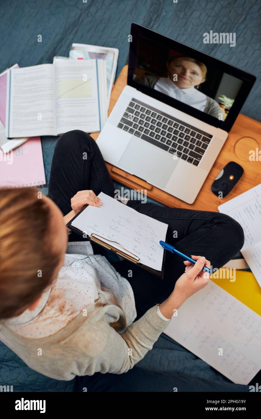 Young woman student having classes, learning online, watching lesson ...