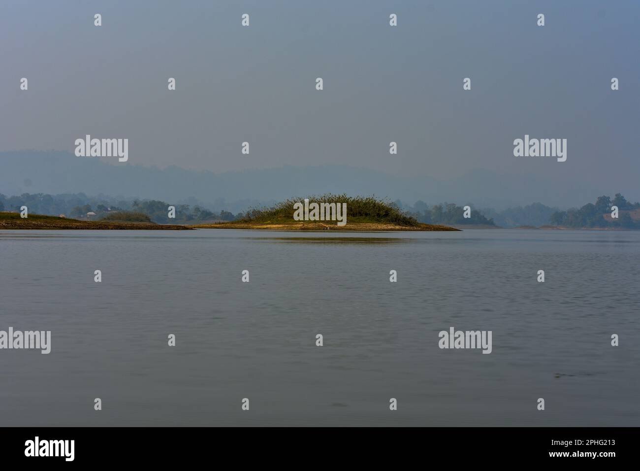 A small lake island in Dumboor . With clear water and reflection of ...