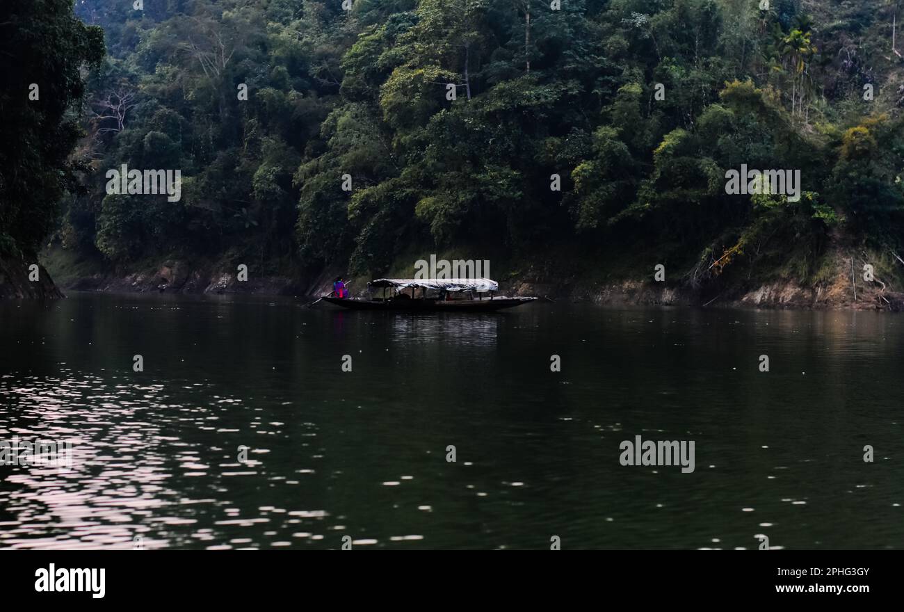 A boat in Dumboor lake of Tripura , India . With clear water Stock ...