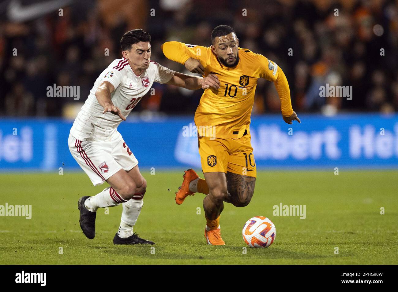 ROTTERDAM - (lr) Ethan Britto of Gibraltar, Memphis Depay of Holland ...