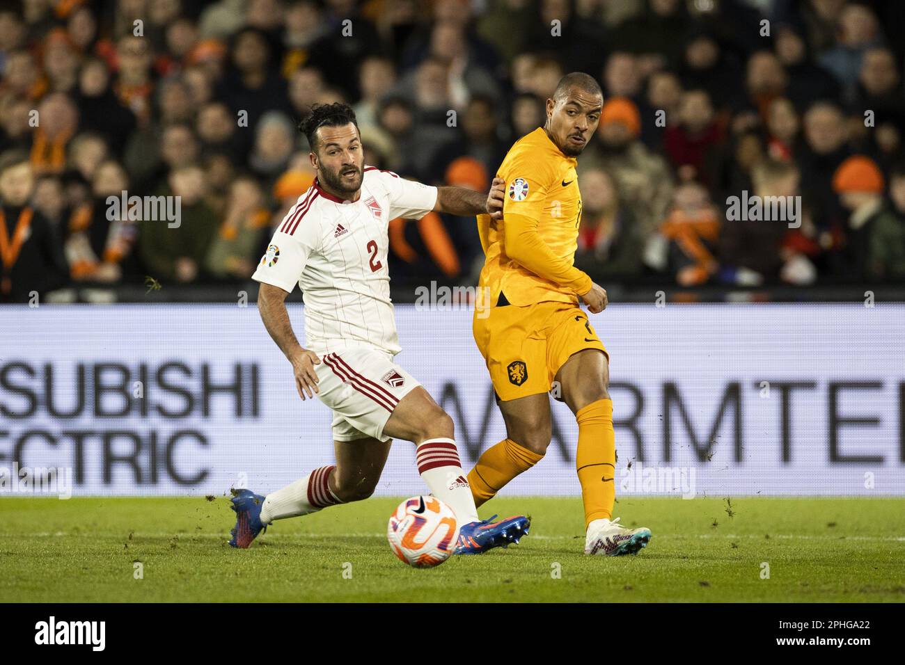 ROTTERDAM - (l-r) Ethan Jolley of Gibraltar, Donyell Malen of Holland ...
