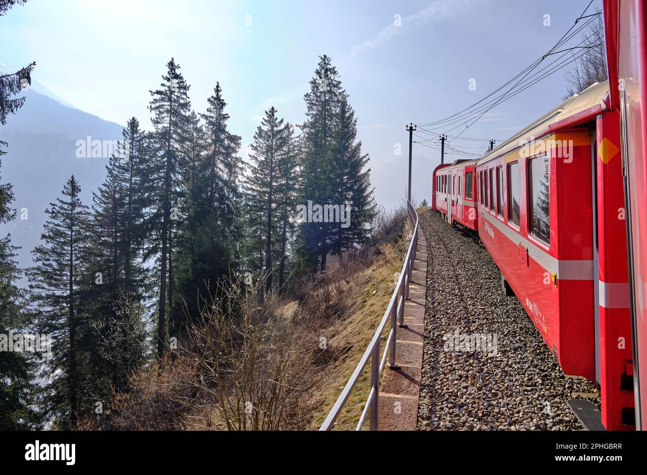 The famous Swiss mountain train of Bernina Express crossed italian and ...