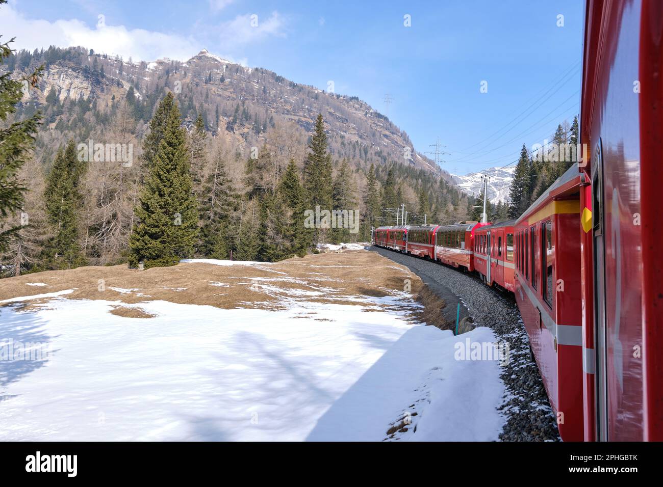 The famous Swiss mountain train of Bernina Express crossed italian and ...