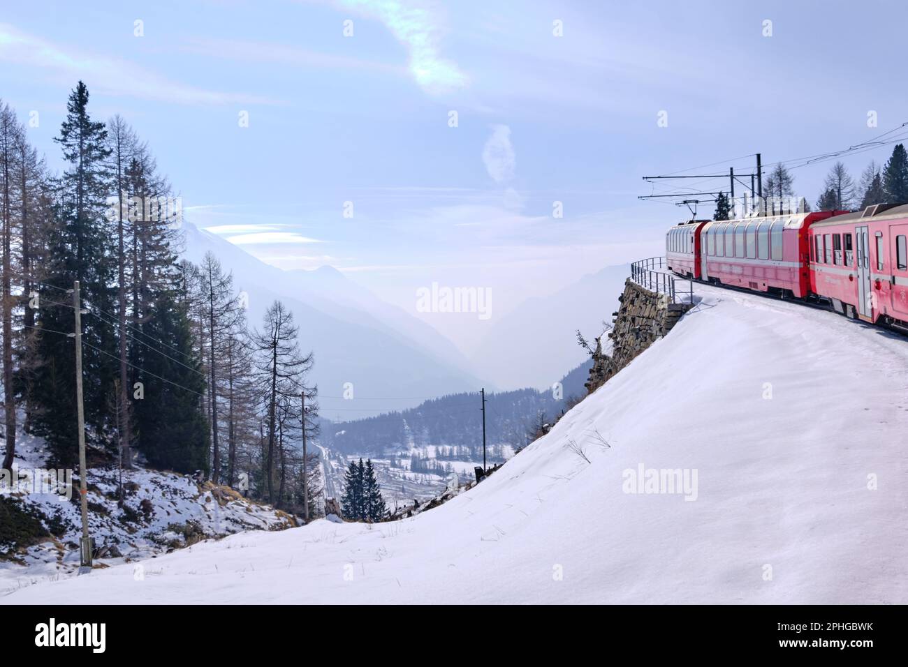 The famous Swiss mountain train of Bernina Express crossed italian and ...