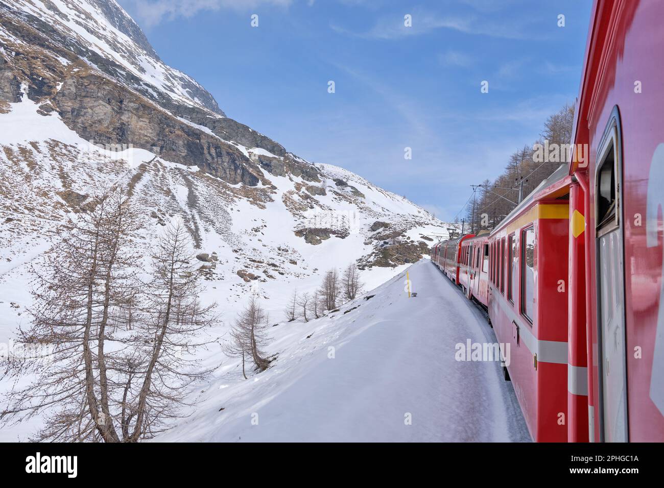 The famous Swiss mountain train of Bernina Express crossed italian and ...