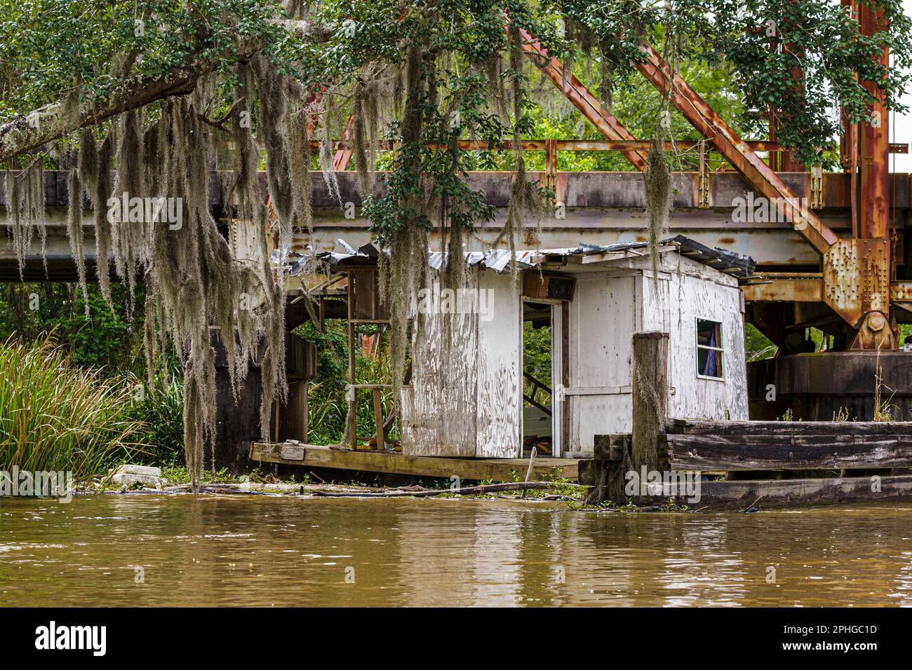 Remains of a floating shack wedged against a bridge in the Louisiana ...