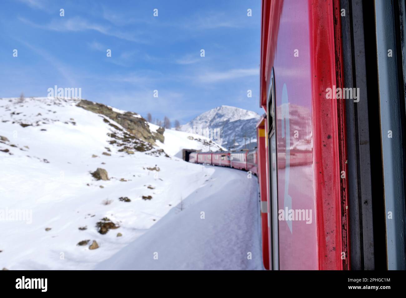 The famous Swiss mountain train of Bernina Express crossed italian and ...