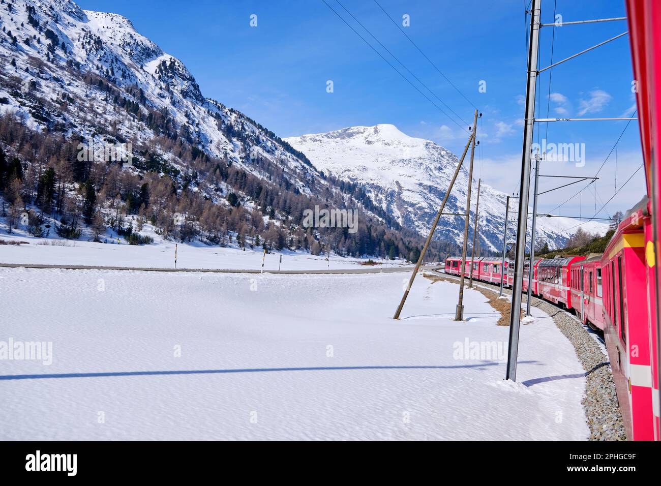 The famous Swiss mountain train of Bernina Express crossed italian and ...
