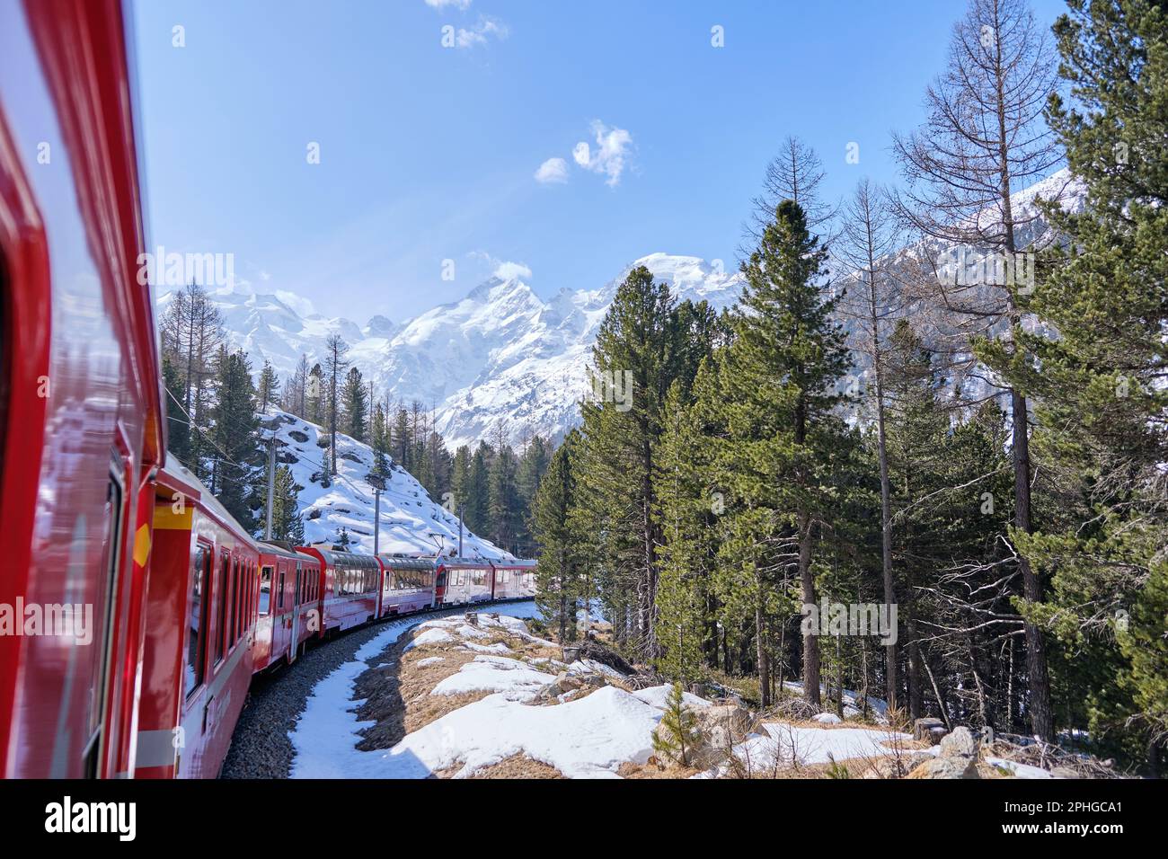 The famous Swiss mountain train of Bernina Express crossed italian and ...