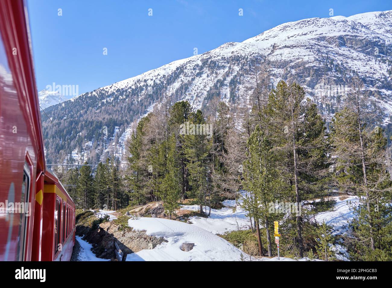 The famous Swiss mountain train of Bernina Express crossed italian and ...