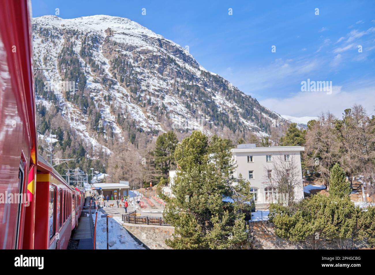 The famous Swiss mountain train of Bernina Express crossed italian and ...