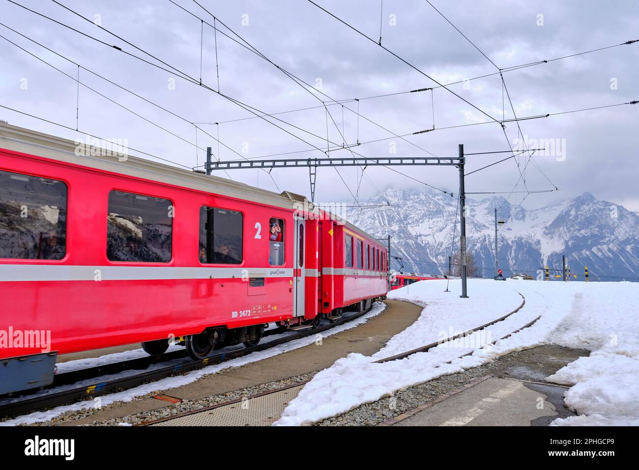 The famous Swiss mountain train of Bernina Express crossed italian and ...