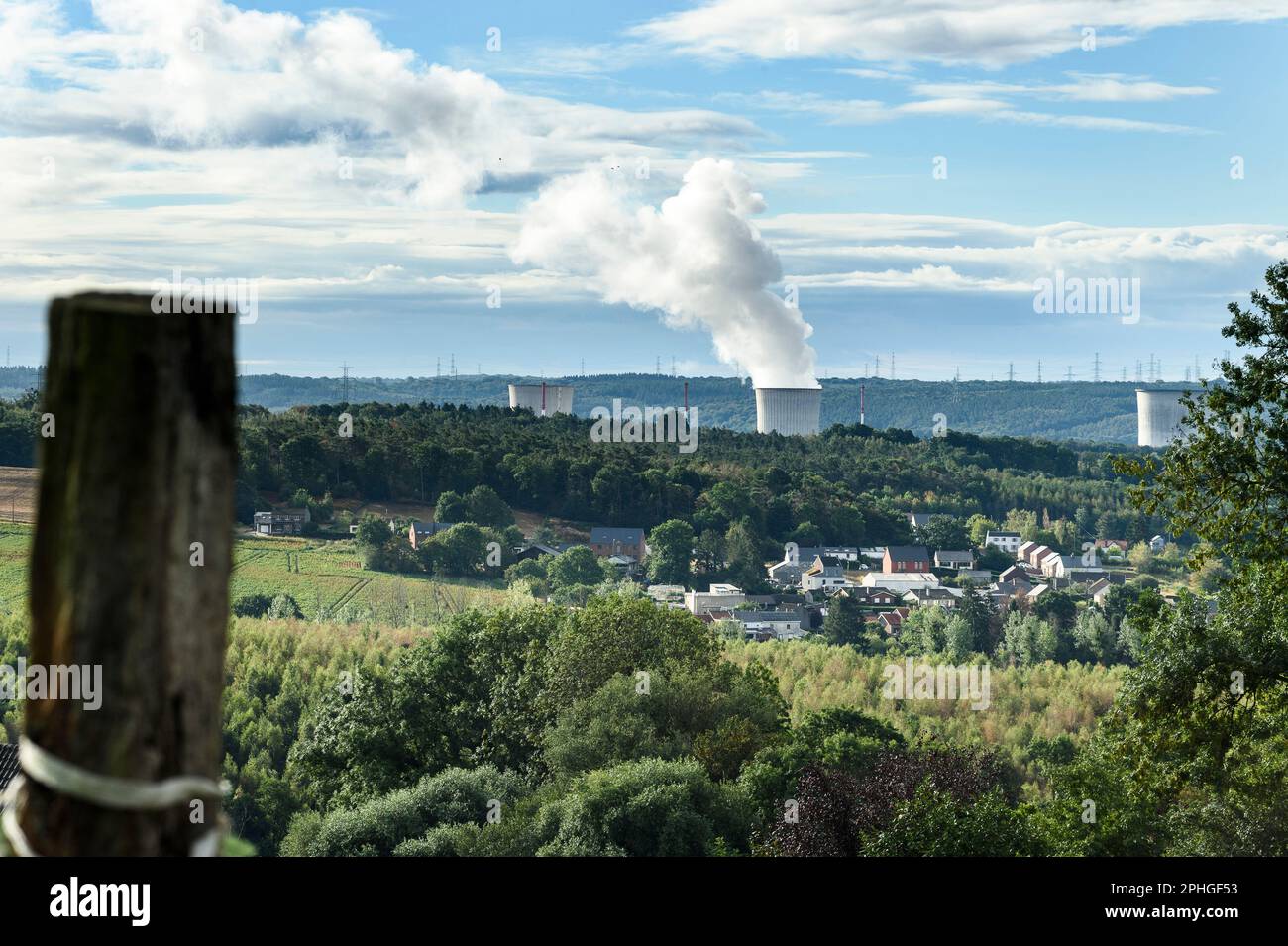 Chimney of the nuclear power plant of Tihange, located along the river ...