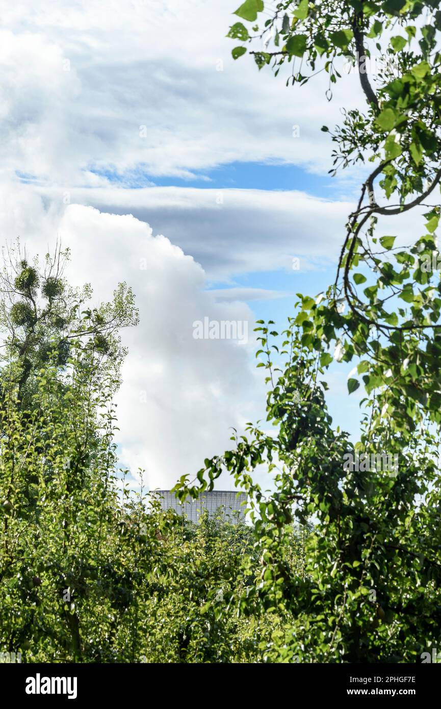 Chimney of the nuclear power plant of Tihange, located along the river ...