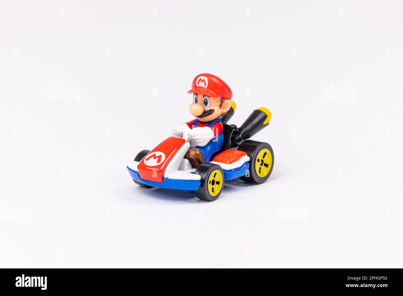 A closeup shot of Mario Kart mini toy car isolated on a white ...