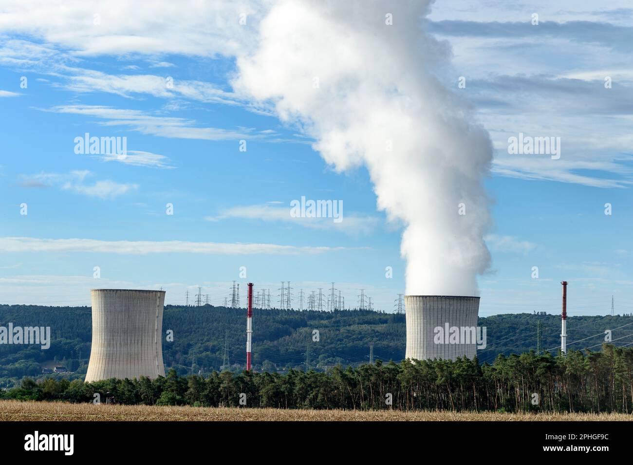 Chimney of the nuclear power plant of Tihange, located along the river ...