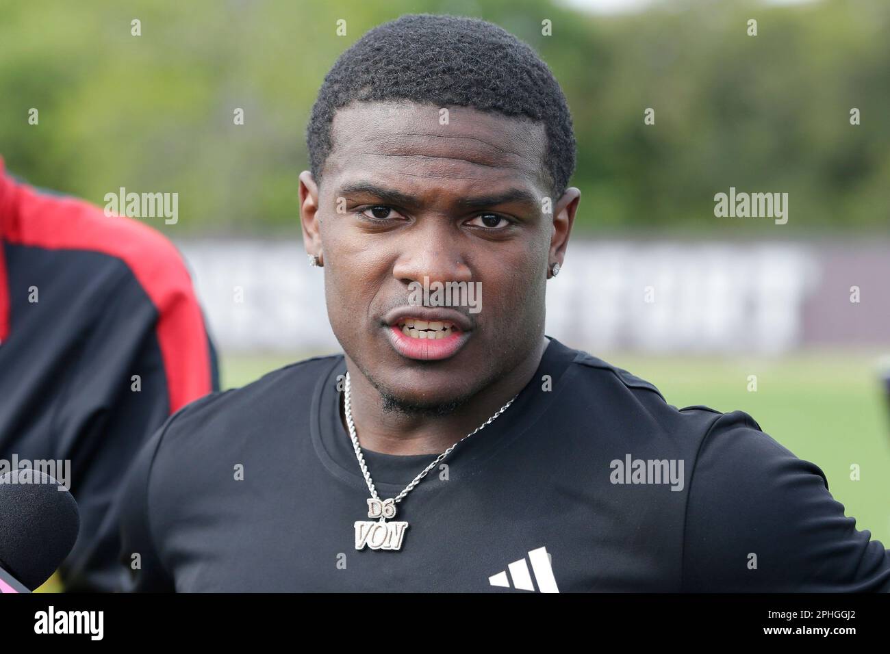 Devon Achane talks to the press after running drills during Texas A&M ...