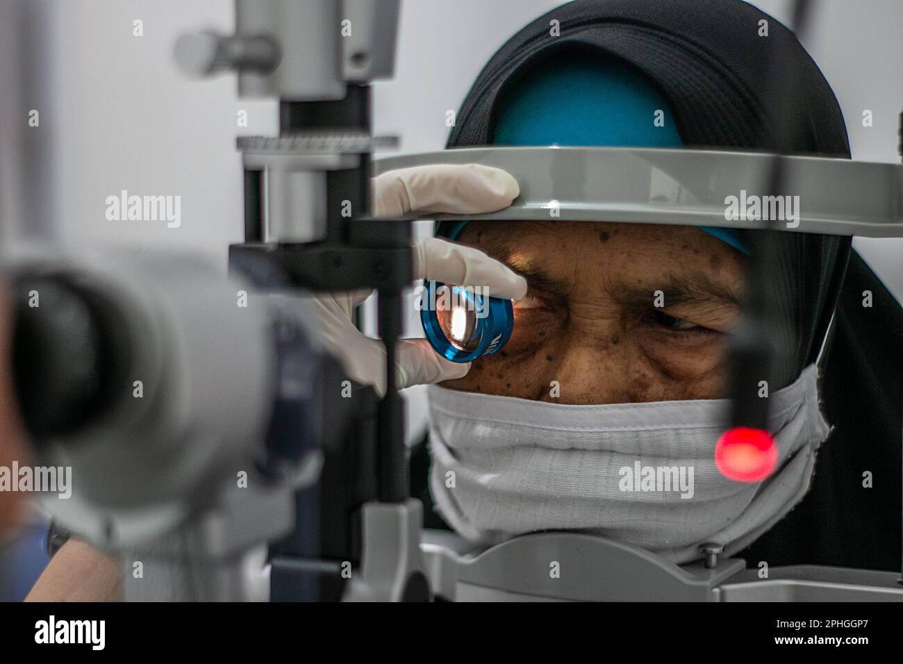 BOGOR, INDONESIA - March 27, 2023: A resident carries out an eye test ...