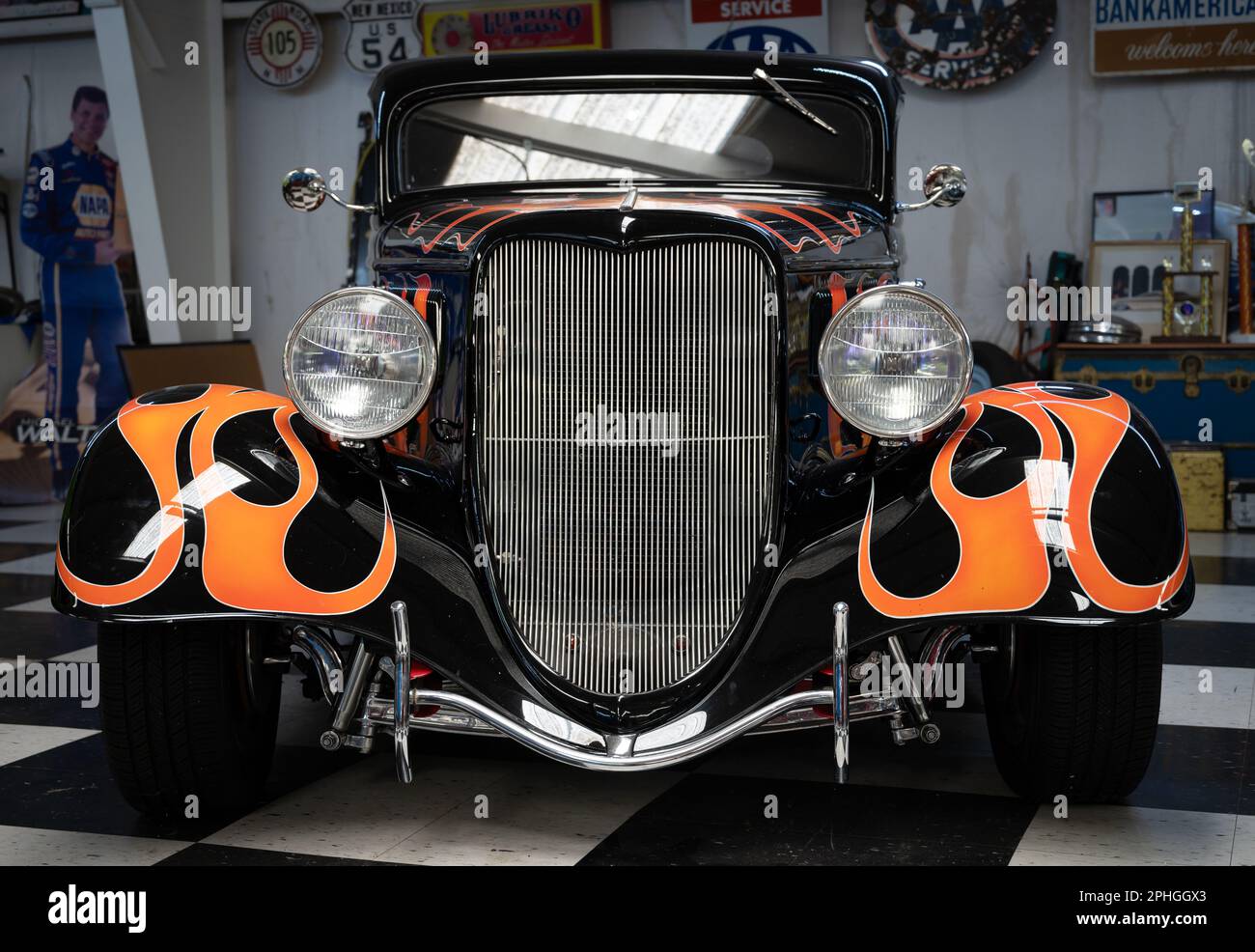 Detail of a historic black Ford Model 40 Hot Rod with flames of fire ...