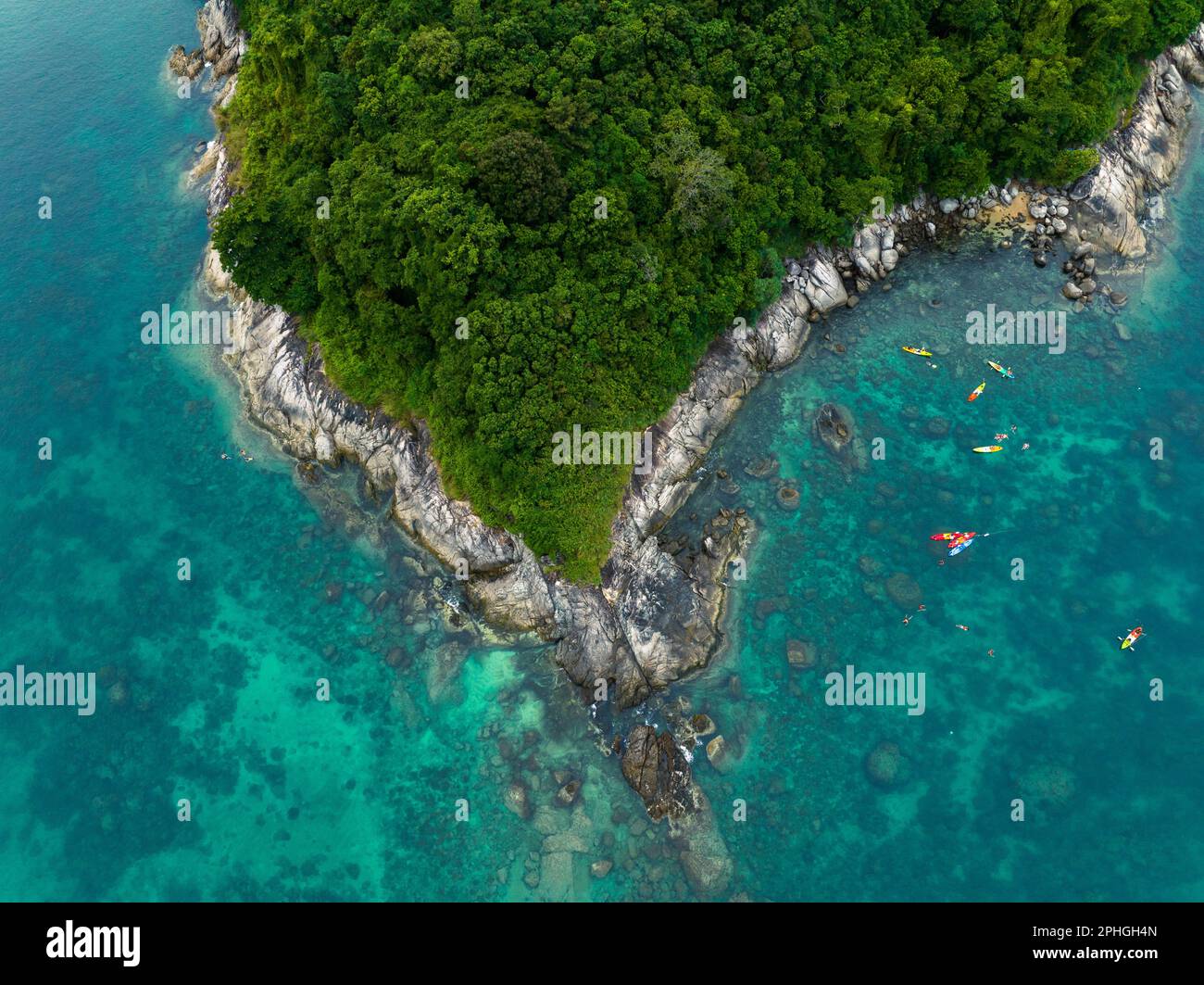 Aerial top view tourists kayaking, swimming and snorkeling in andaman ...