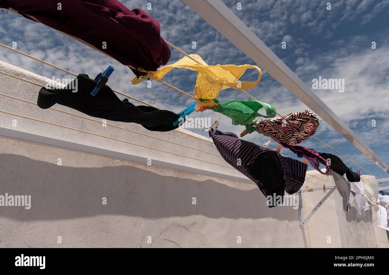 Langebaan, South Africa. 2023. Washing drying on a clothes line in a ...