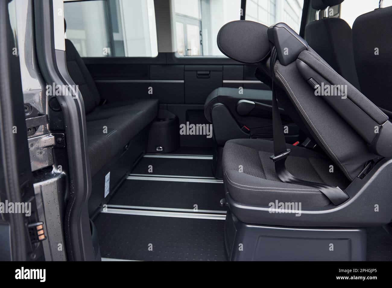 Side close up view of modern automobile interior with movable seat ...