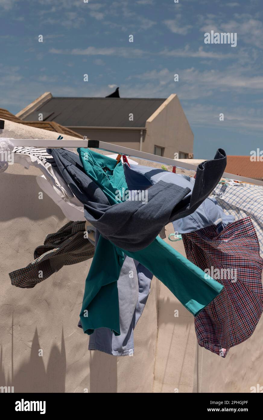 Langebaan, South Africa. 2023. Washing drying on a clothes line in a ...