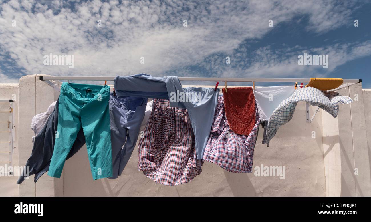 Langebaan, South Africa. 2023. Washing drying on a clothes line in a ...