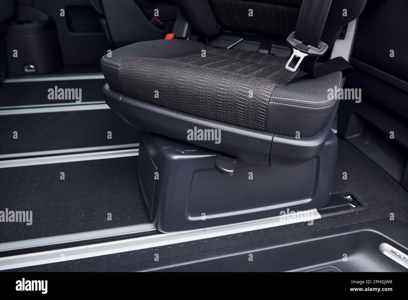 Side close up view of modern automobile interior with movable seat ...