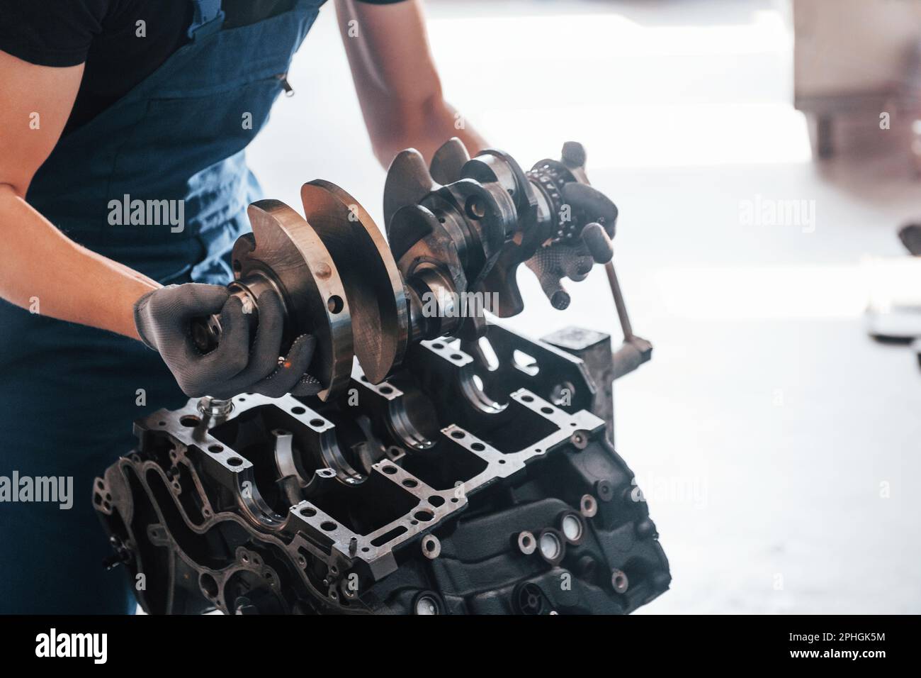 Professional repairman works with broken automobile engine Stock Photo ...