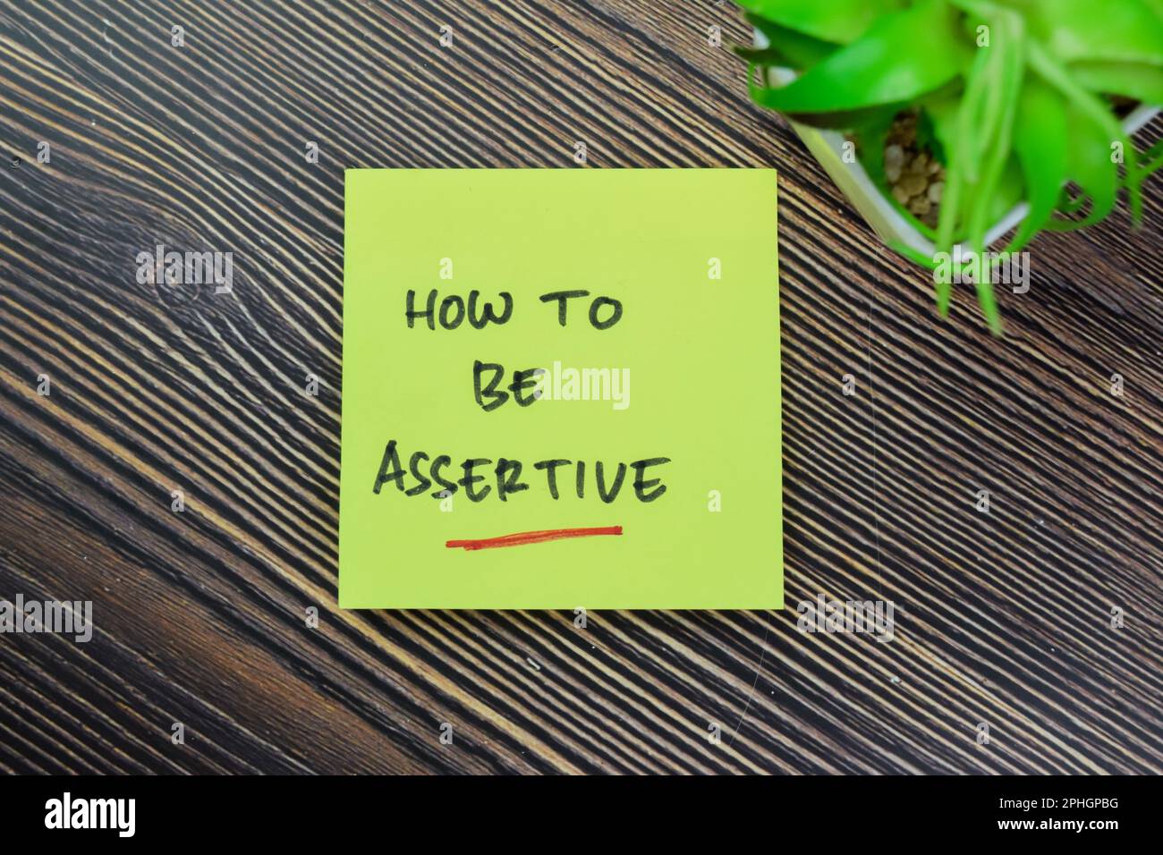 Concept of How to Be Assertive write on sticky notes isolated on Wooden ...