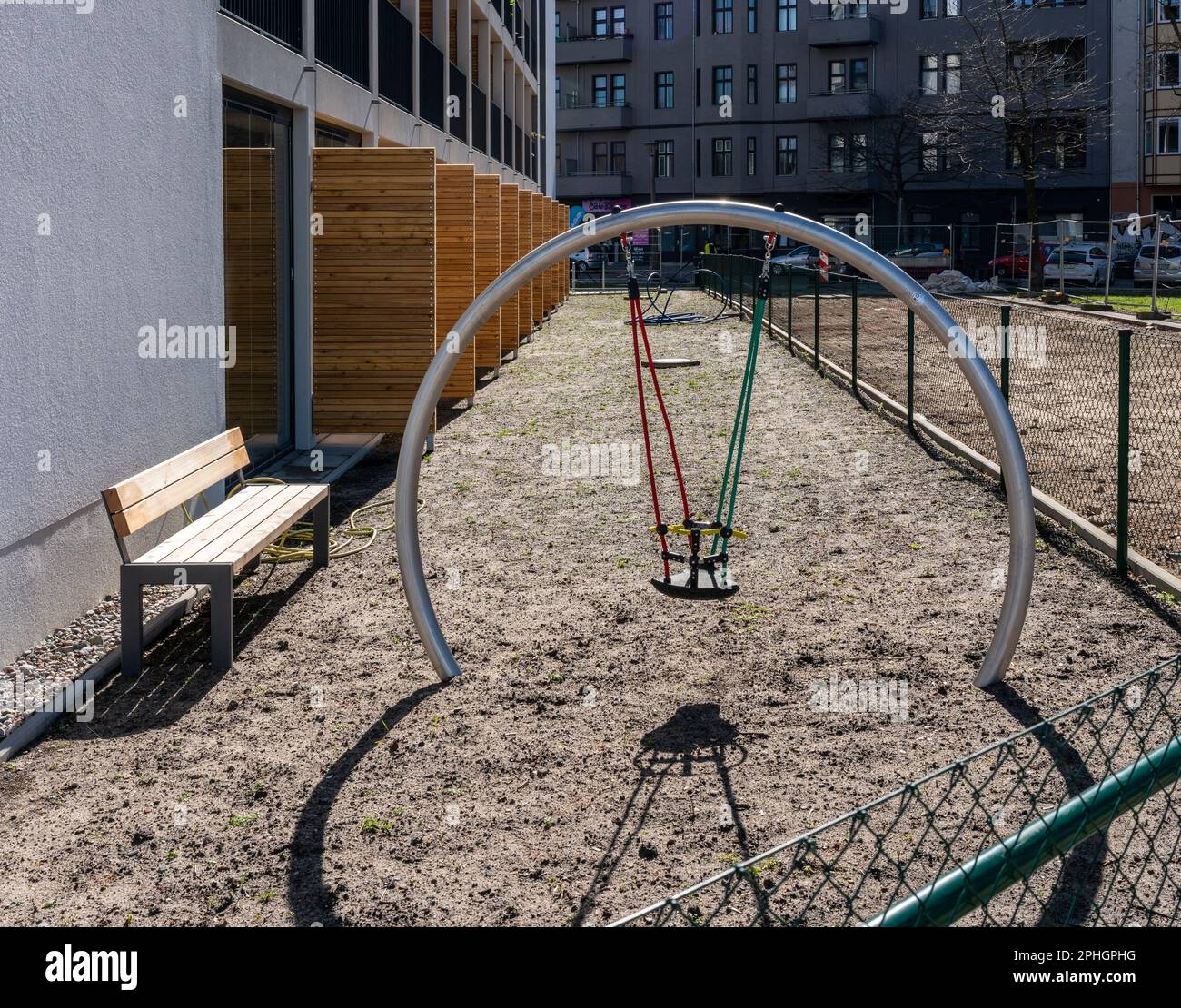 Modern Children Swing In Front Garden, Friedrichshain, Berlin, Germany ...