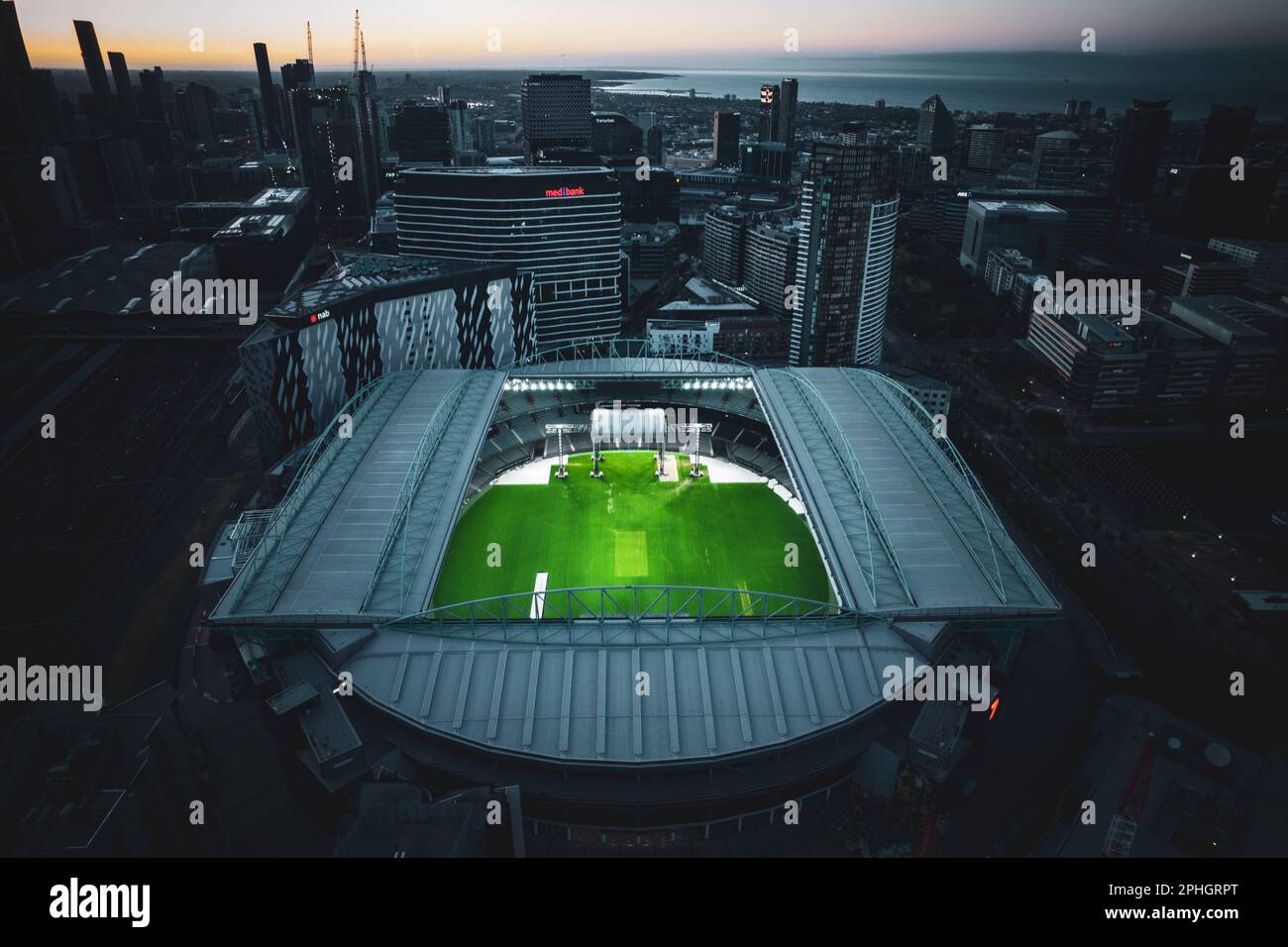 An aerial view of Marvel stadium with roof open revealing bright green ...