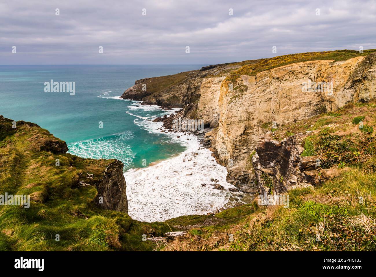 Looking down on Hole Beach and caves at Trebarwith Strand, Tintagel ...