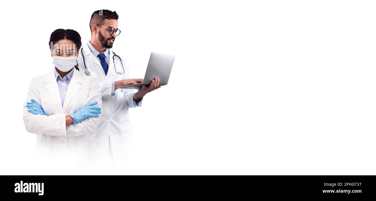Medical Ad. Two Multiethnic Doctors In Uniform Standing Isolated Over ...