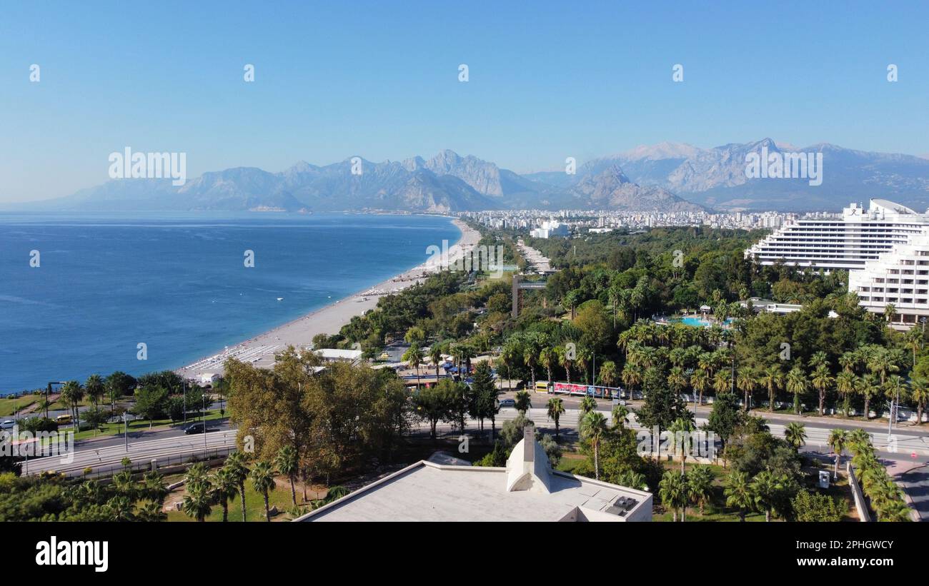 Aerial view of a bustling Antalya cityscape featuring an array of tall ...
