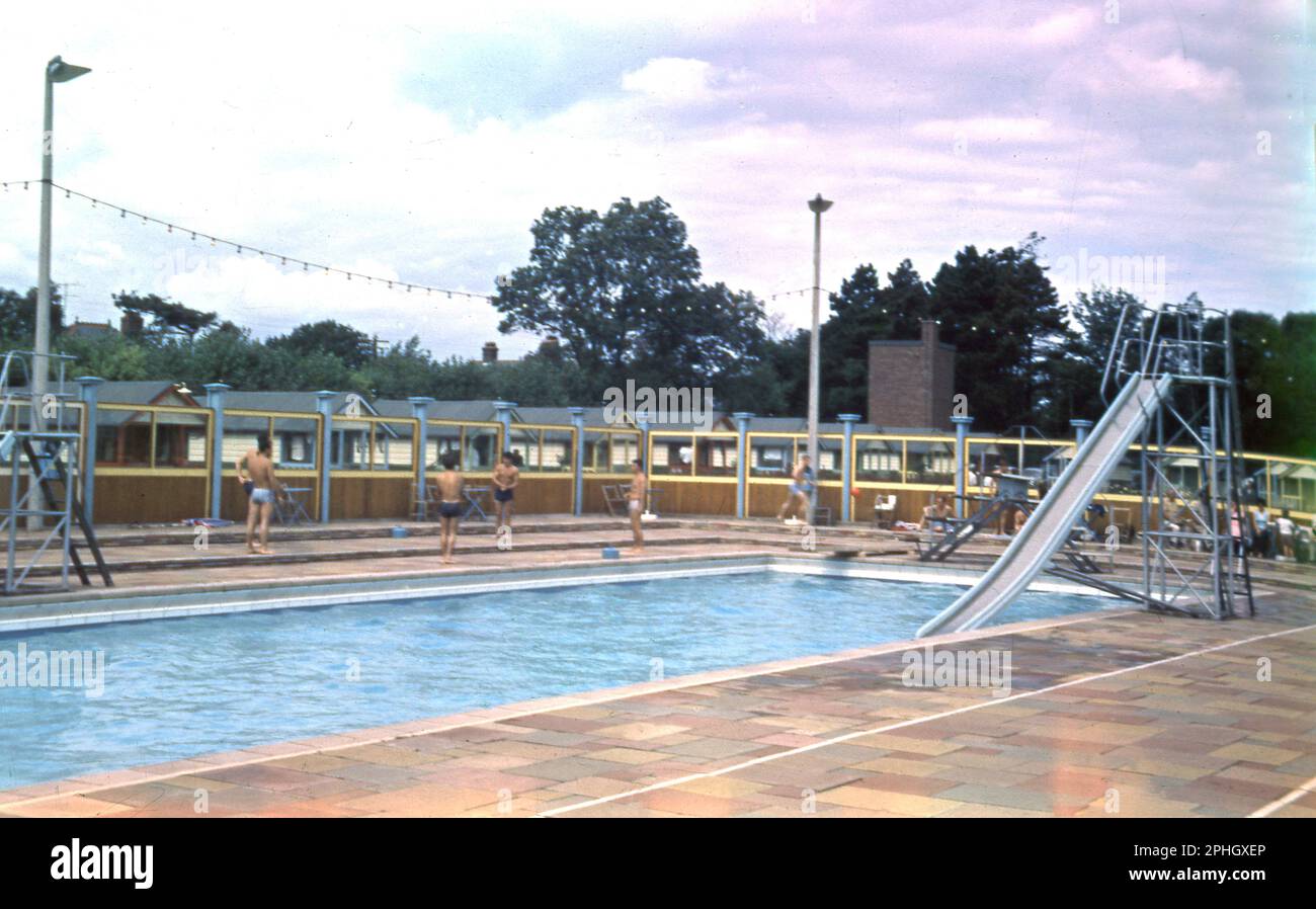 1960s, historial, people at a holiday camp swimming pool, England, UK ...