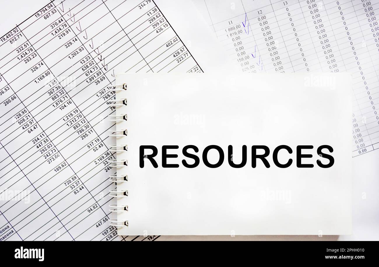 resources word on notepad and digital charts Stock Photo - Alamy