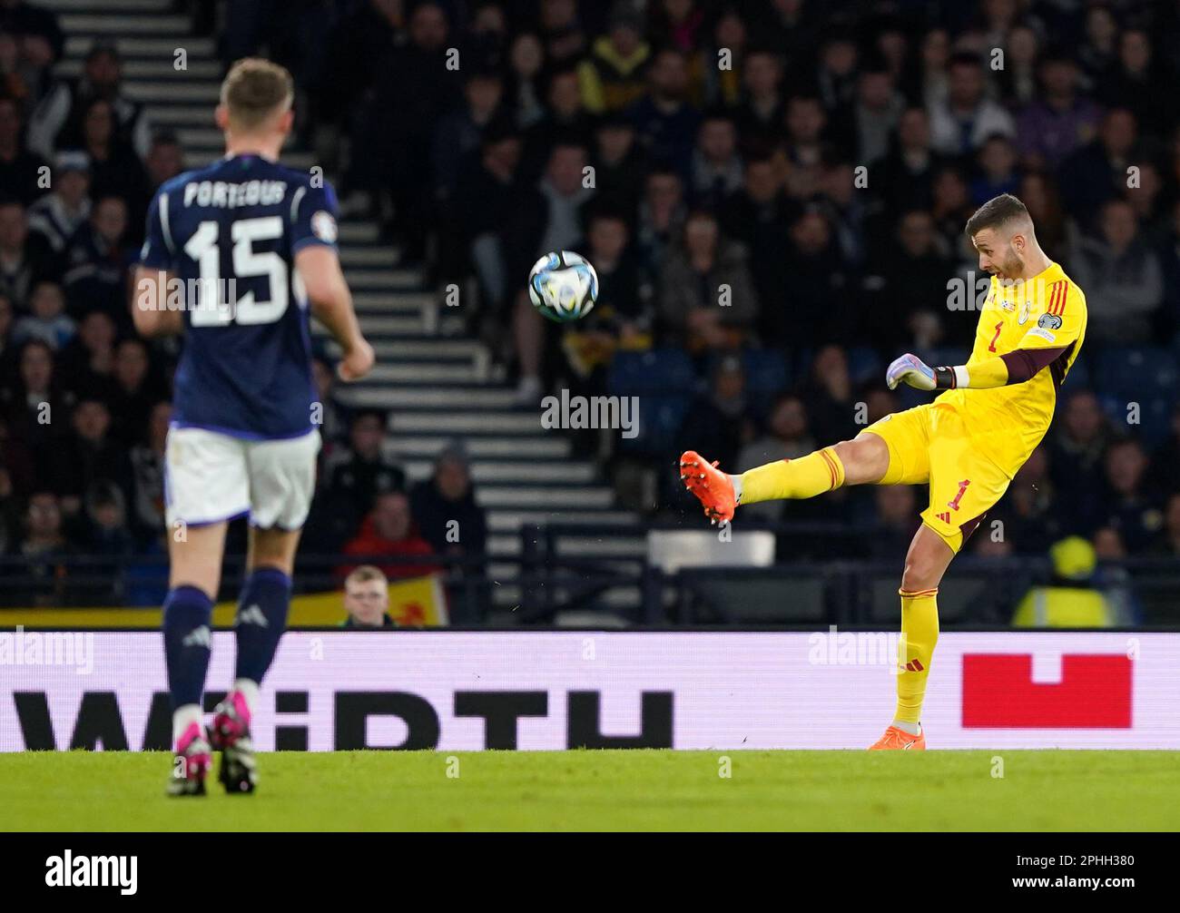 Scotland goalkeeper Angus Gunn (right) clears his lines during the UEFA ...