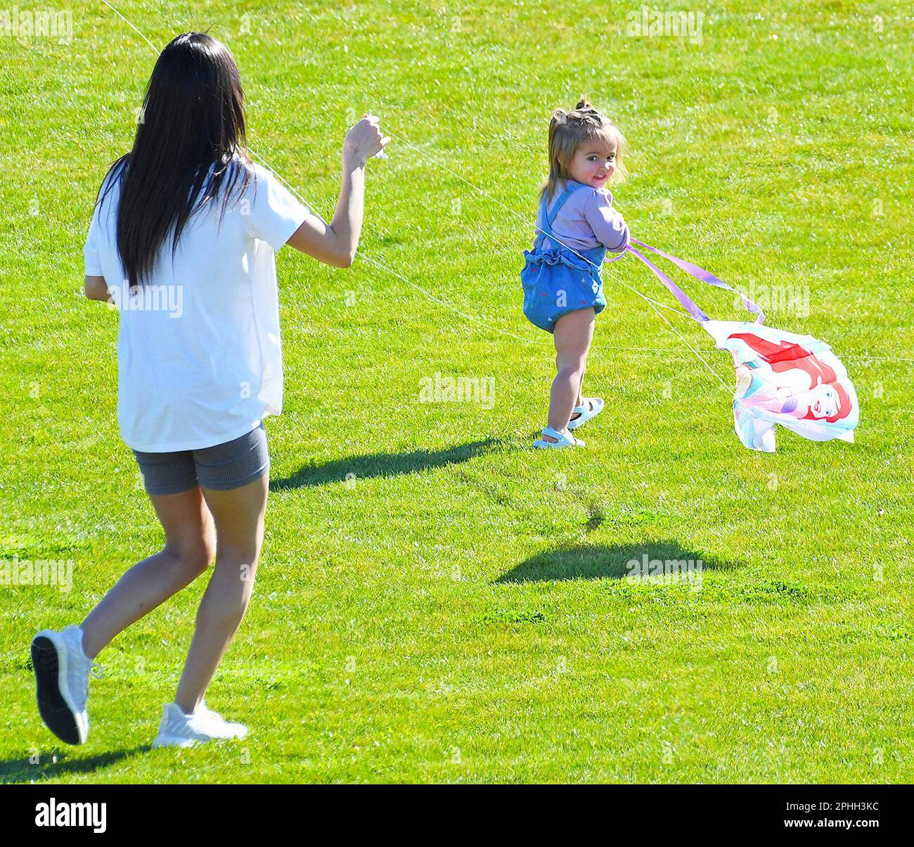 A little girl shows mom that she's ready to let the Little Mermaid soar ...
