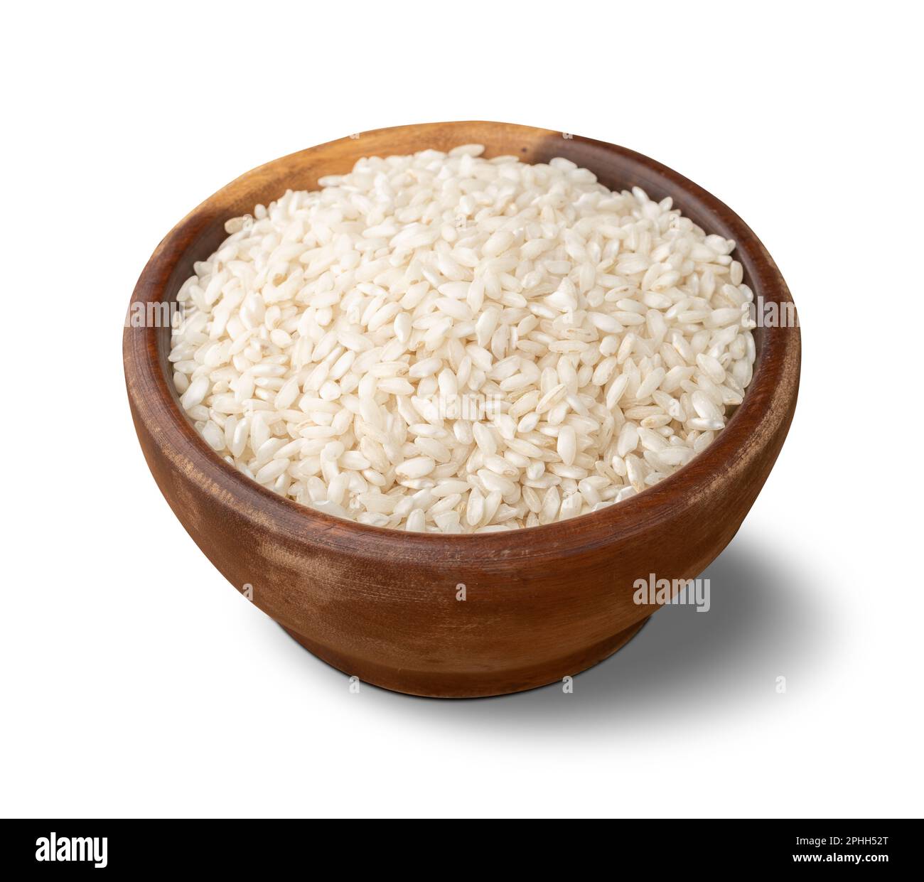 Raw carnaroli risotto rice in a bowl isolated over white background ...