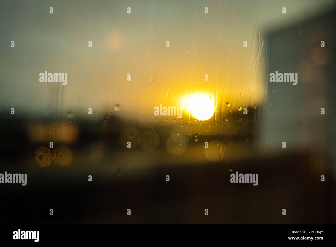 Sun shining through a rainy window Stock Photo - Alamy