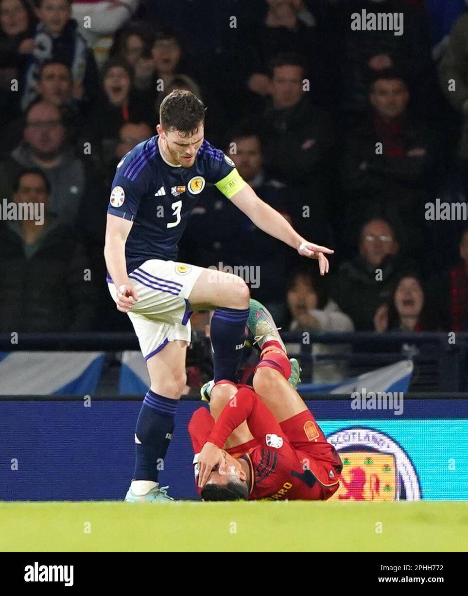 Spain's Pedro Porro reacts to a challenge from Scotland's Andrew ...