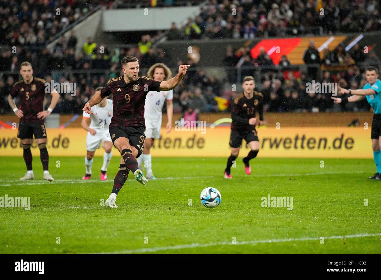 Germany's Niclas Fullkrug, scores from a penalty against Belgium during ...