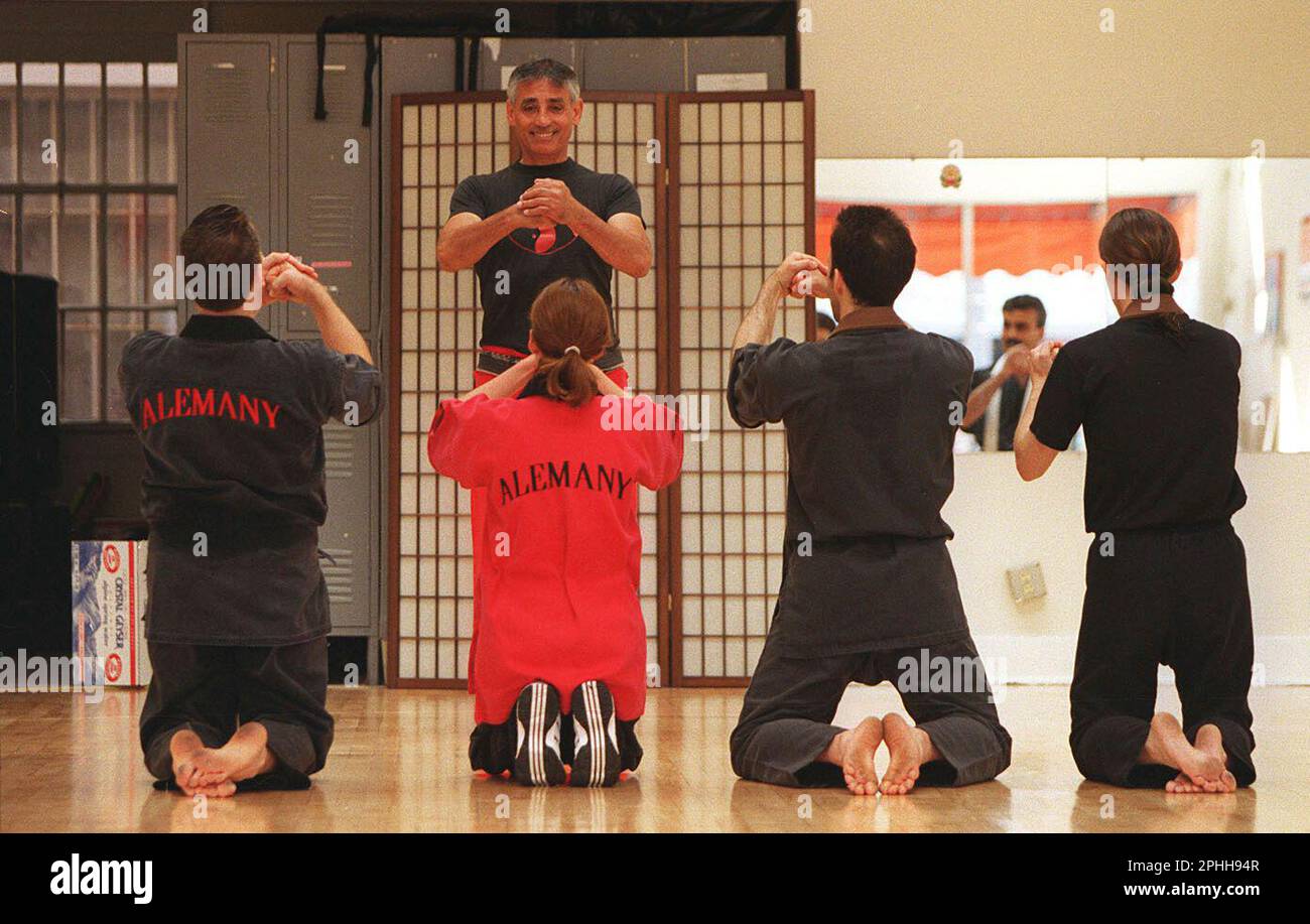 MARTIAL ARTS 2/C/29SEP97/PZ/LS ----- Rick Alemany (facing) bows to his ...