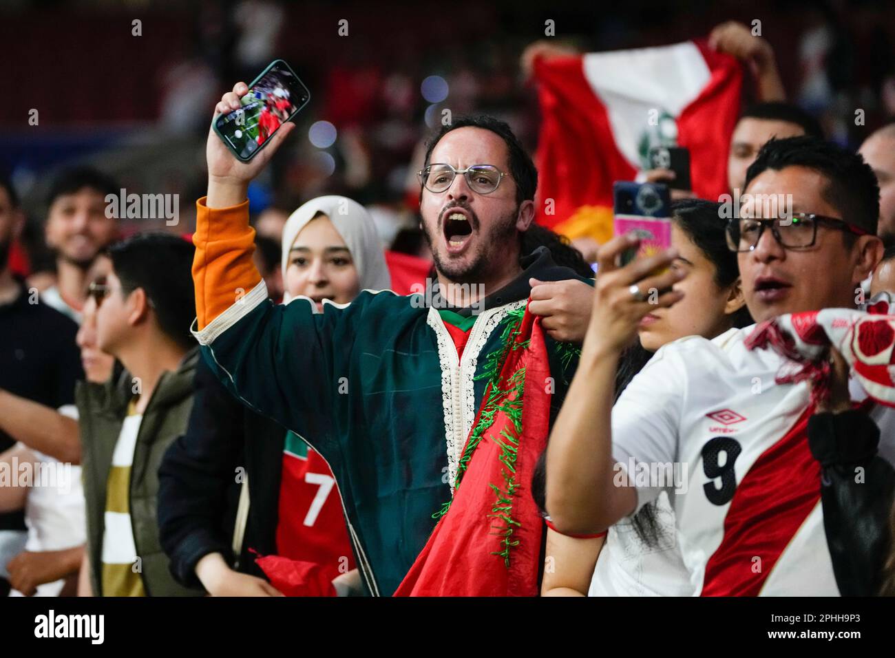 Fans cheer during the International friendly soccer match between ...