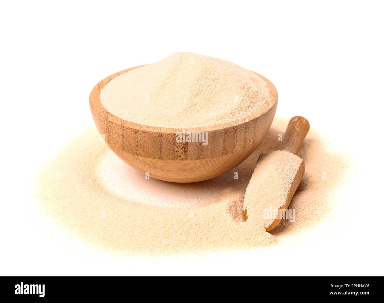 Bowl and scoop with raw semolina on white background Stock Photo - Alamy
