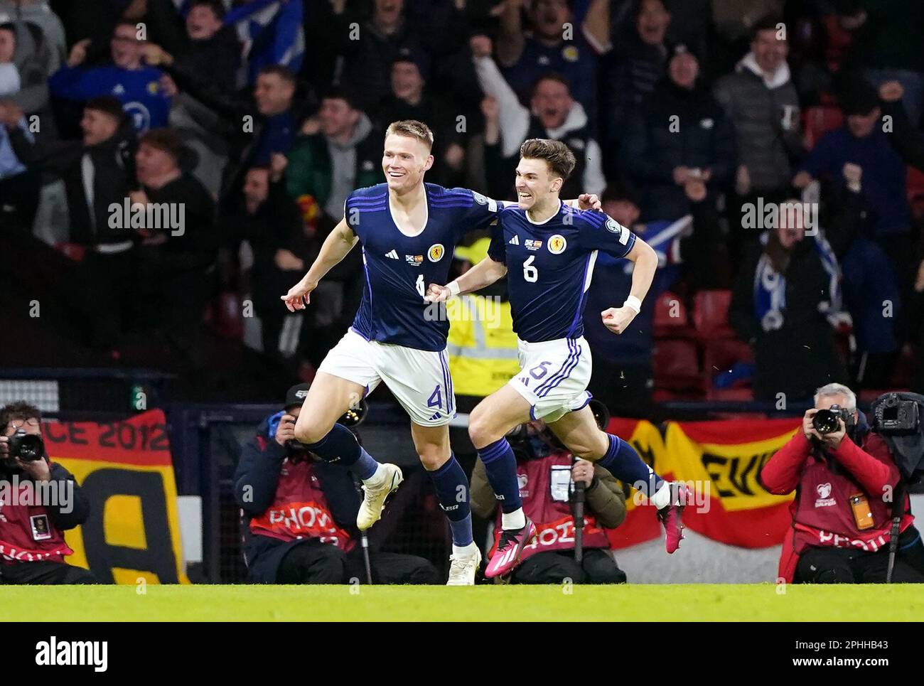 Scotland's Scott McTominay (left) celebrates scoring their side's ...