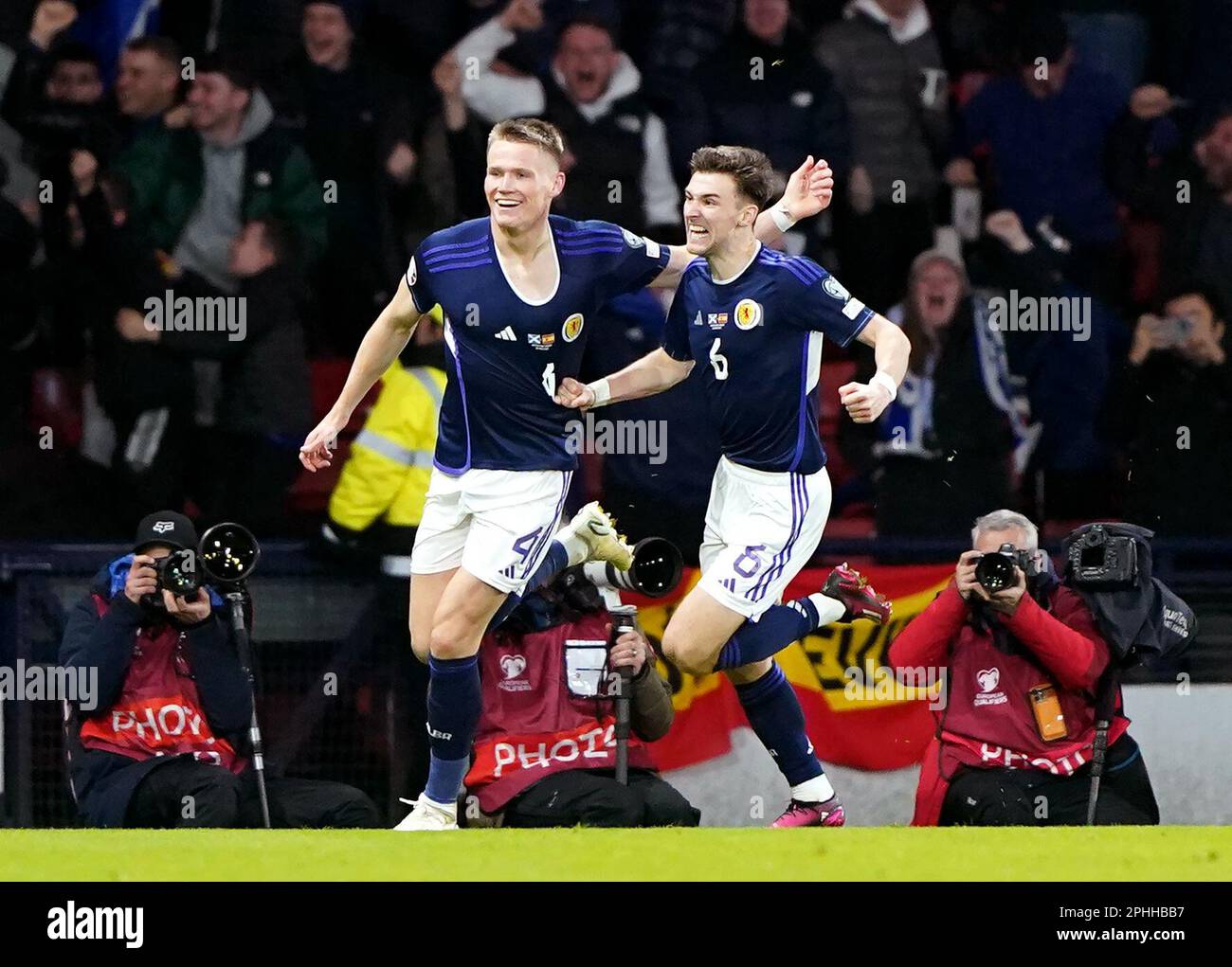 Scotland's Scott McTominay (left) celebrates scoring their side's ...