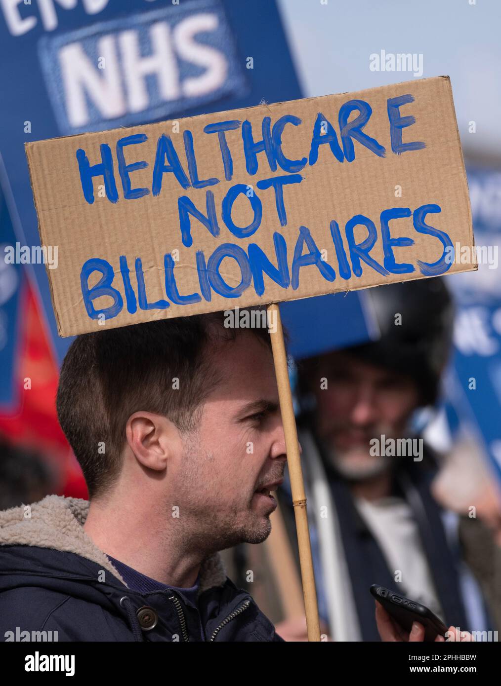 Protester at the SOS NHS National Demo in London, supporting striking ...